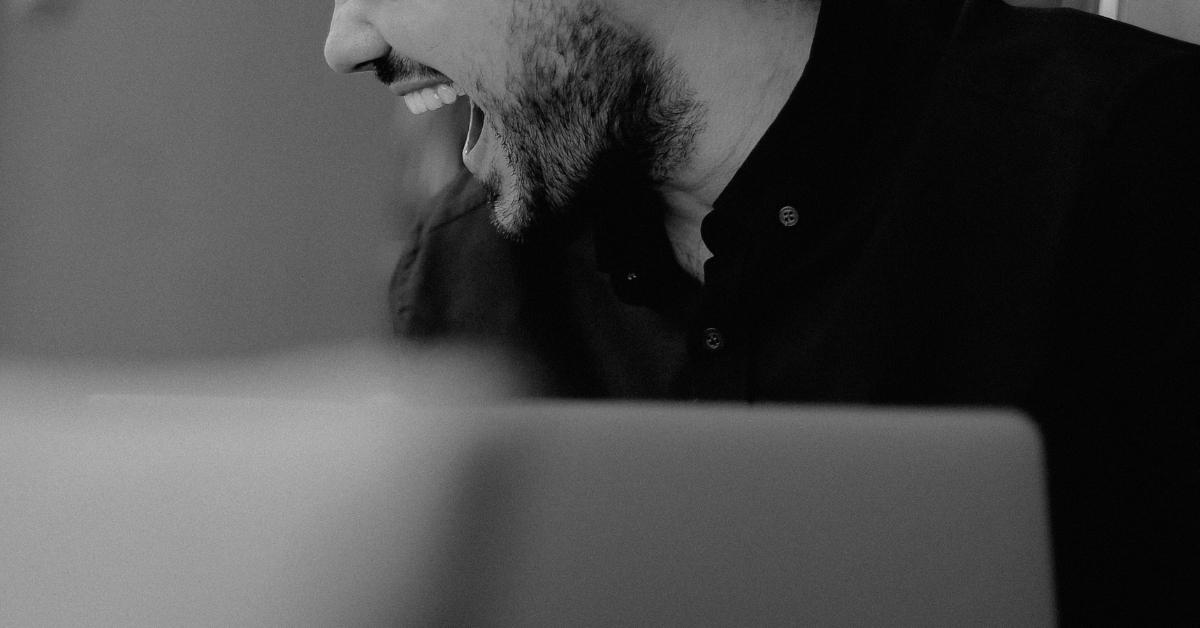 Guy Laughs At ASL Interpreter's Facial Expressions: AITA