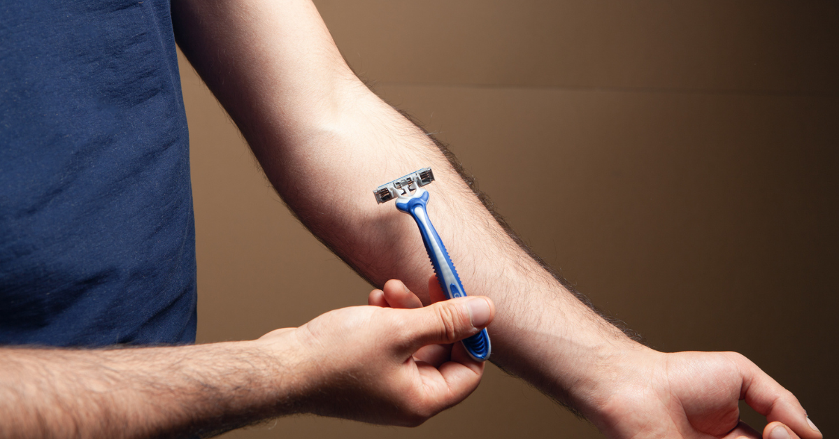 Guy Criticized By Stranger For Shaving His Arms: AITA